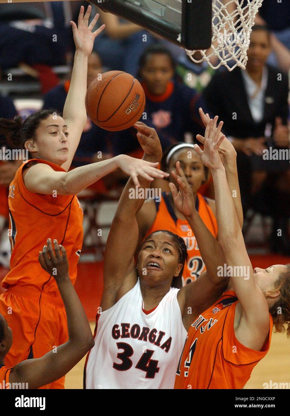 Georgia's Tasha Humphrey (34) is fouled while shooting by Auburn's ...