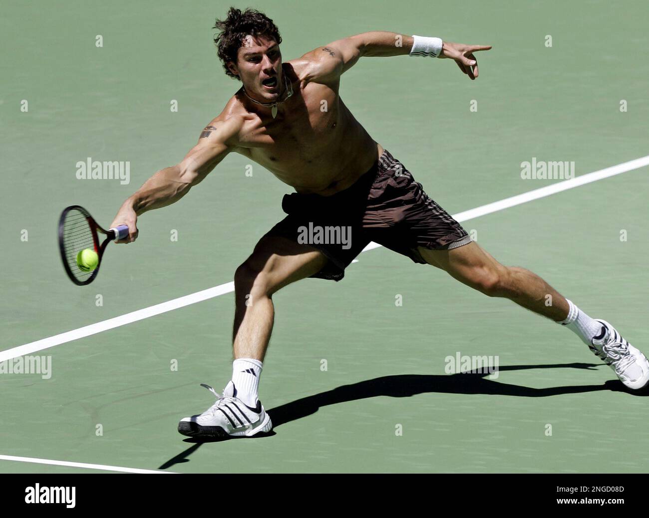 Russia's Marat Safin reaches for a forehand return during a training ...