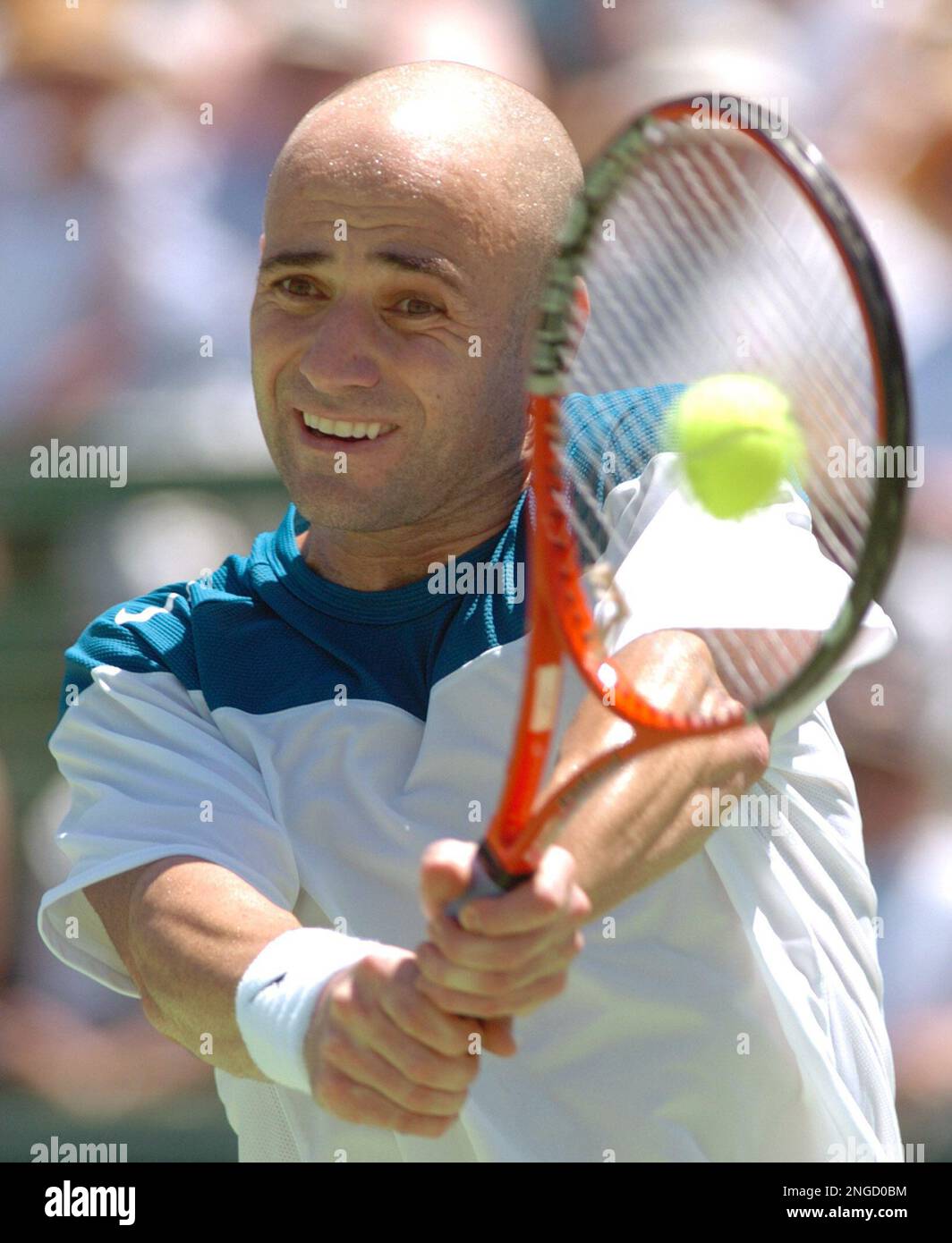 United States' Andre Agassi plays a backhand return during his match ...