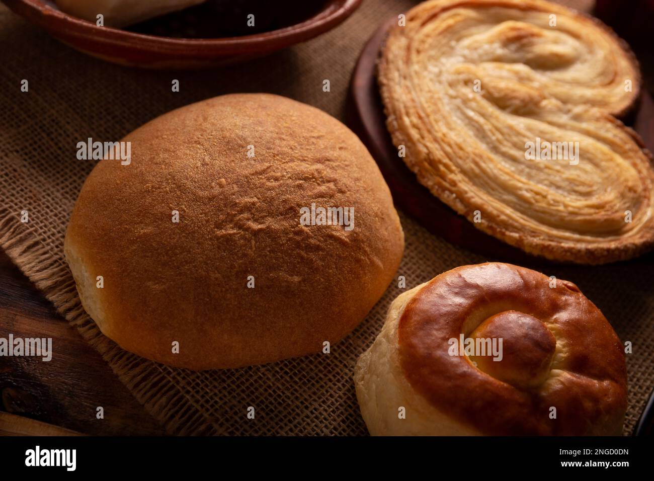 Hojaldra, bisquet and oreja. Hojldra is a typical bread in Mexico City ...