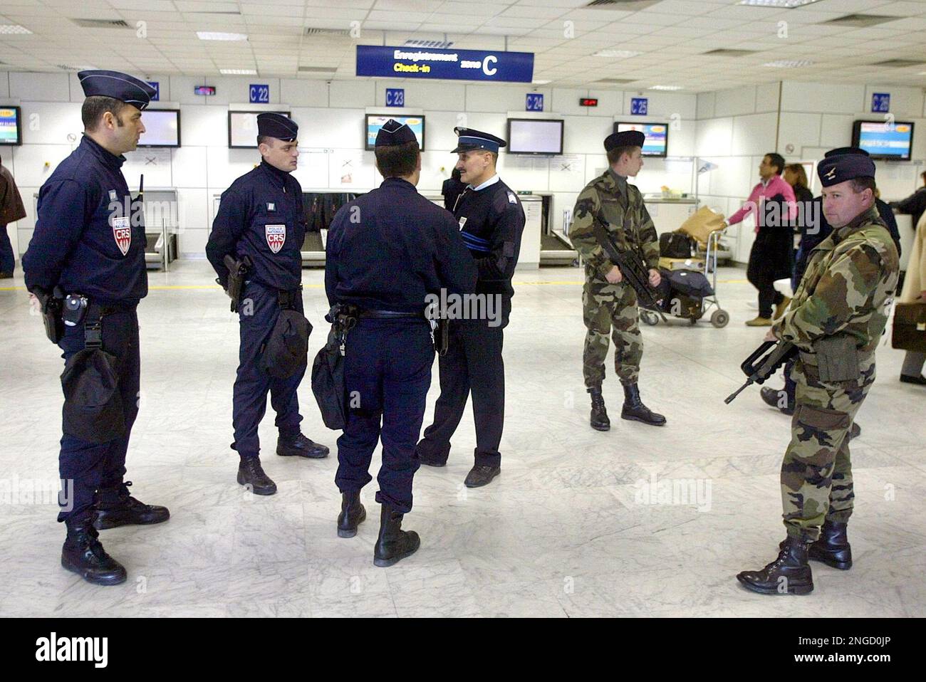 Soldiers and riot police officers patrol the Nice Cote d'Azur airport ...