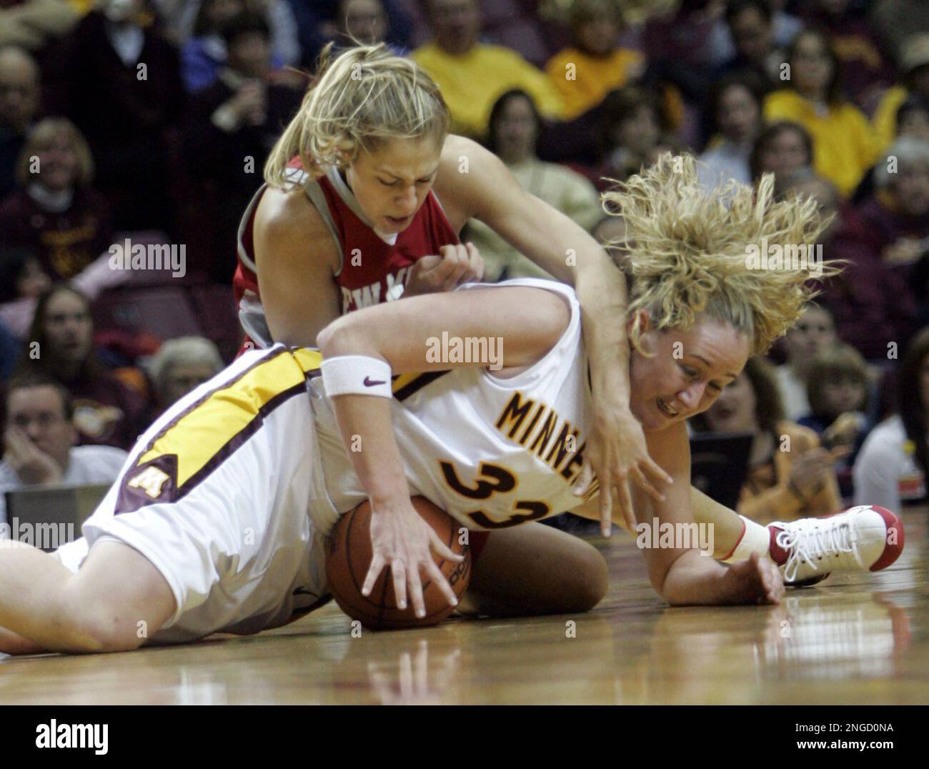 Minnesota forward Jamie Broback (33) and New Mexico center Jana Francis ...