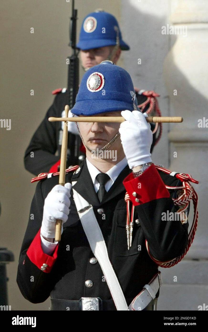 Monaco palace guards observe a moment of silence at the balcony of the Monaco palace, Wednesday ...