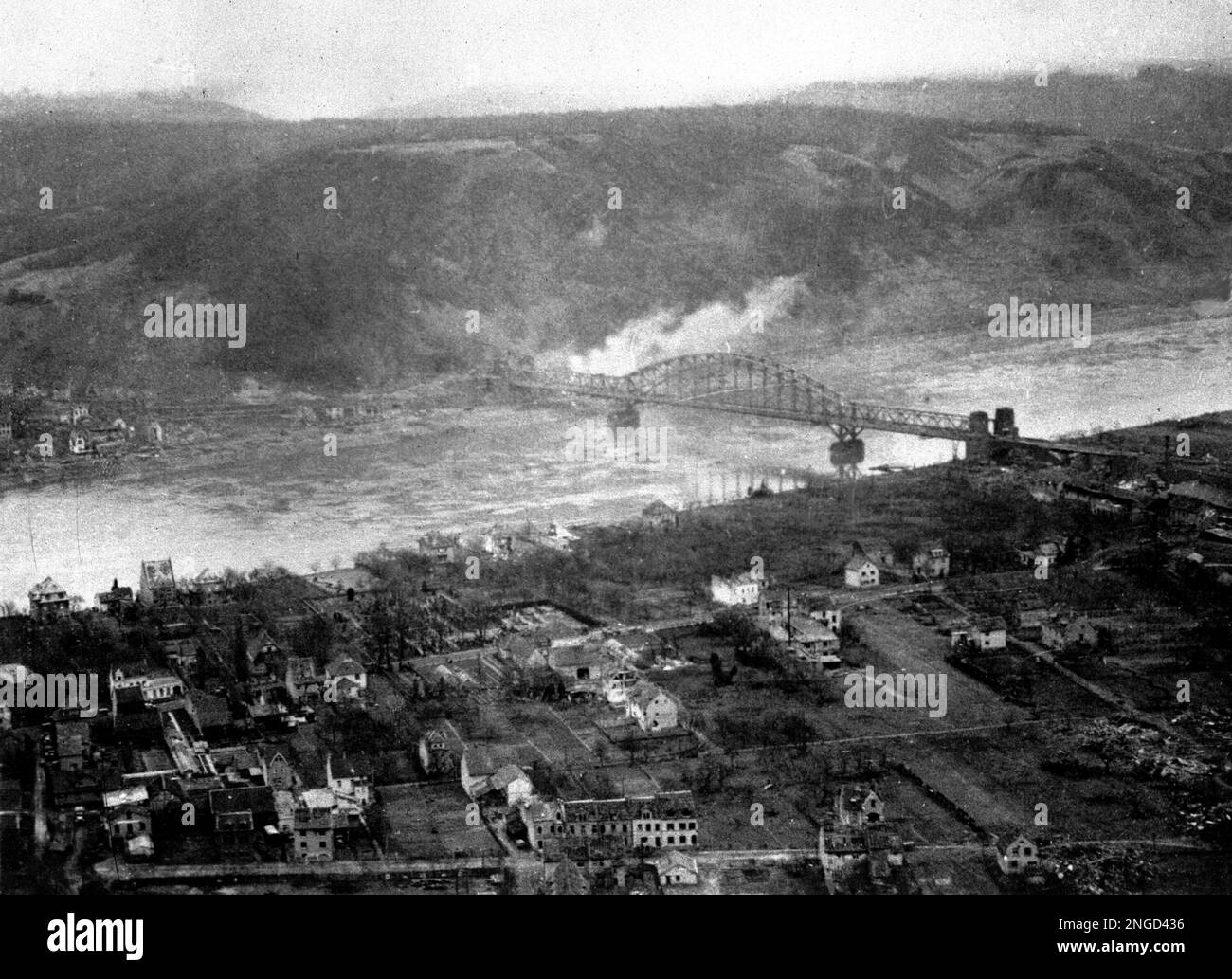 Smoke and turbulent water surround the Ludendorff railway bridge at ...