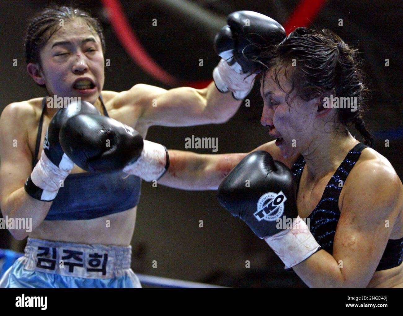 South Korea's Kim Ju-hee, left, and American Melissa Shaffer, right ...