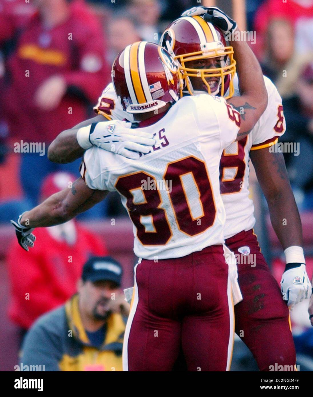 Washington Redskins tight end Robert Royal, right, is hugged in the end ...