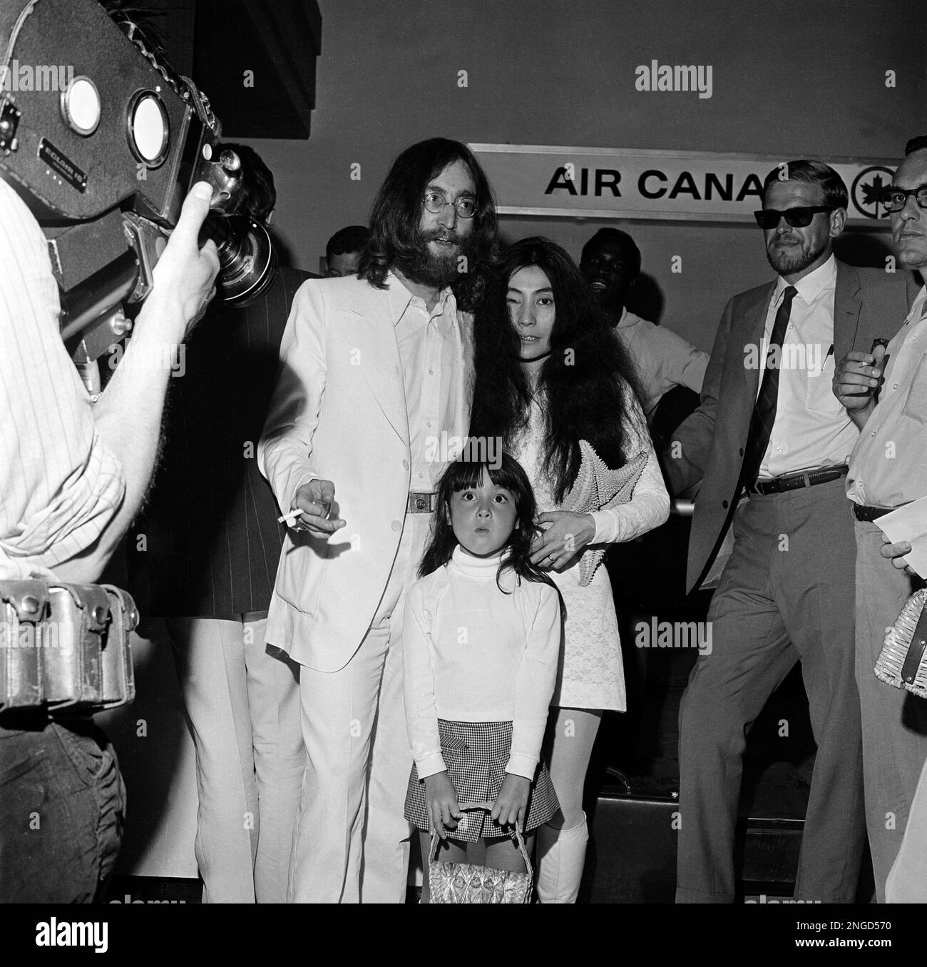 Beatle John Lennon, left, is shown with his wife, Yoko Ono, and Ono's ...