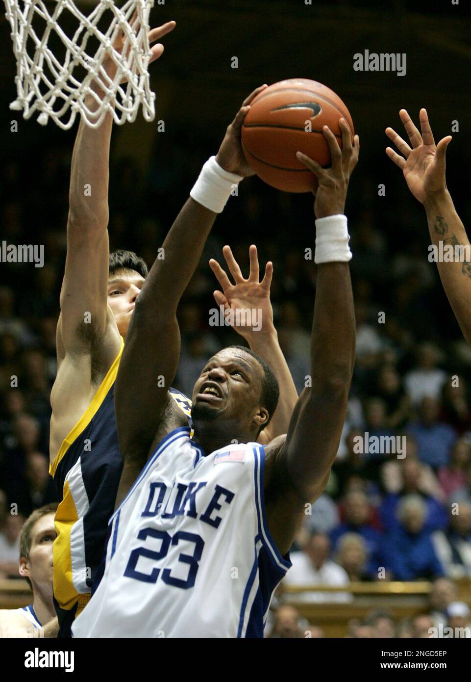 Duke's Shelden Williams (23) drives past Toledo's Allen Pinson during ...