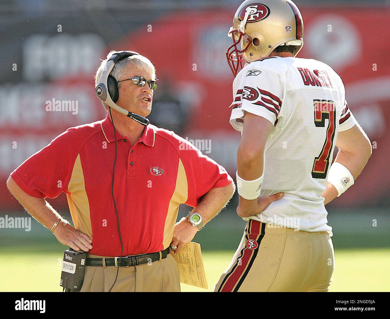 San Francisco 49ers quarterback Ken Dorsey (7) talks with coach Dennis ...