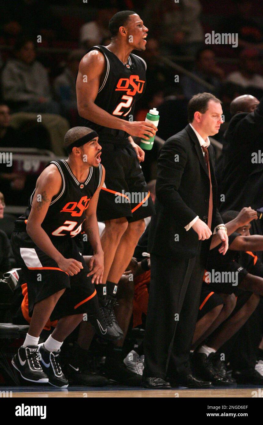 Oklahoma State's JamesOn Curry, left, and Stephen Graham celebrate as ...