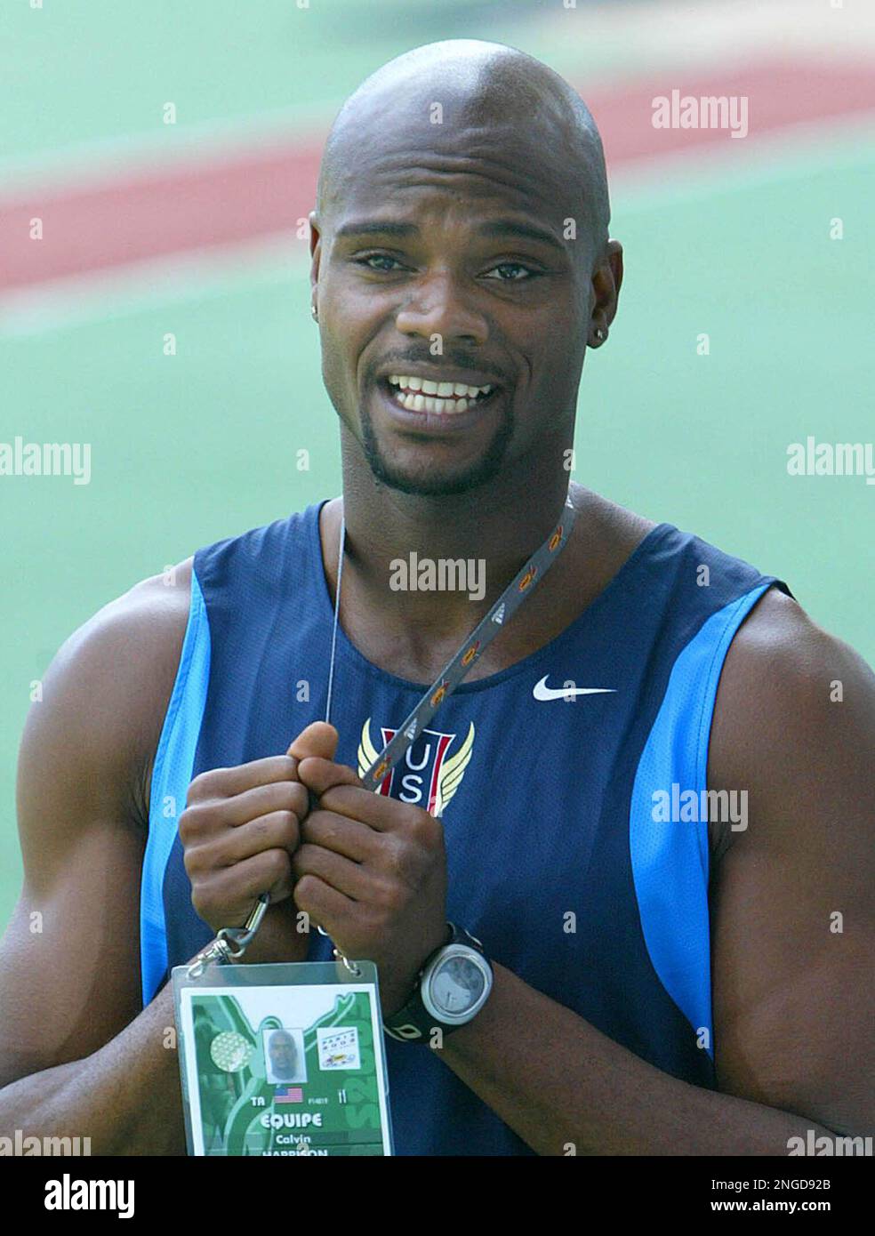 ** FILE ** U.S. 400 meter runner Calvin Harrison gestures as he pauses ...