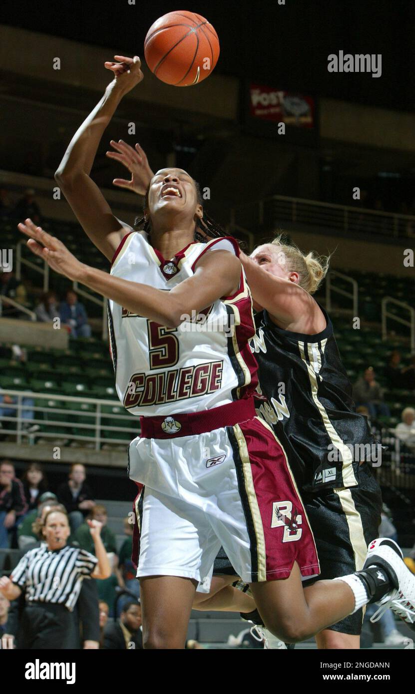 Boston College's Shamika Jackson (5) is fouled on a fast break by ...