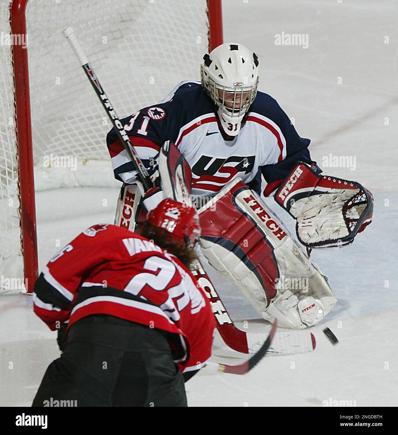 Team USA Goalie Pam Dryer makes a save against Canada's Sarah ...