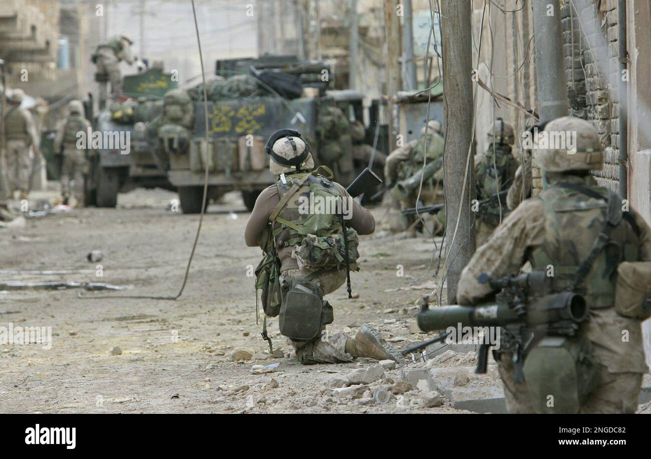 US Marines try to push into the center of Fallujah, Iraq, Friday, Nov ...