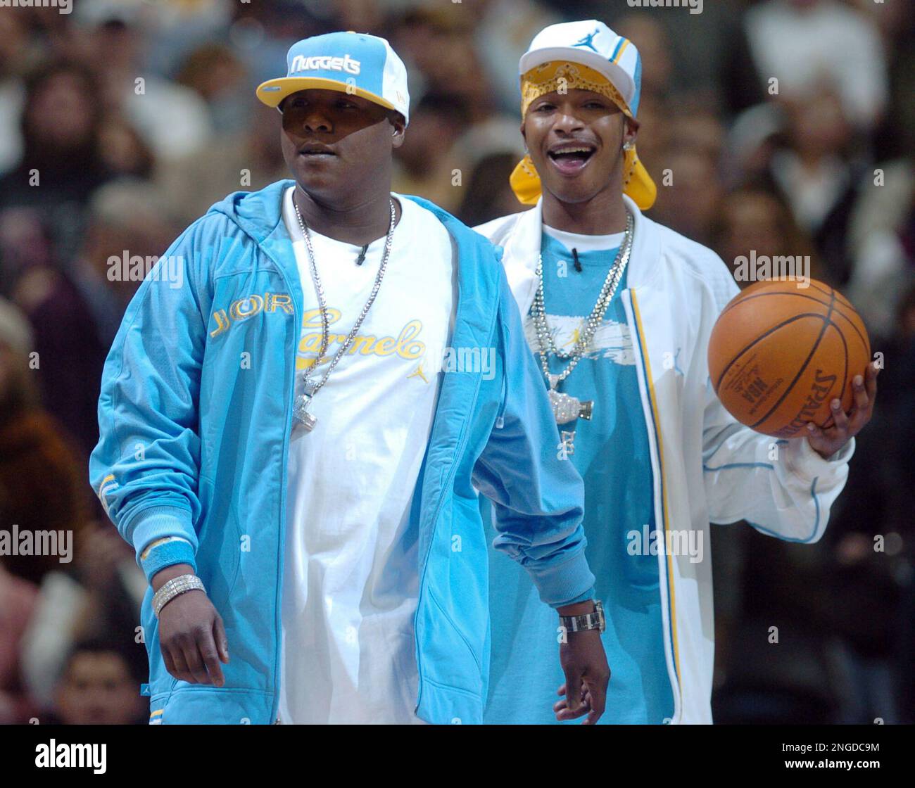 Rap artists Jadakiss, left, and Chingy joke as they head out to ...