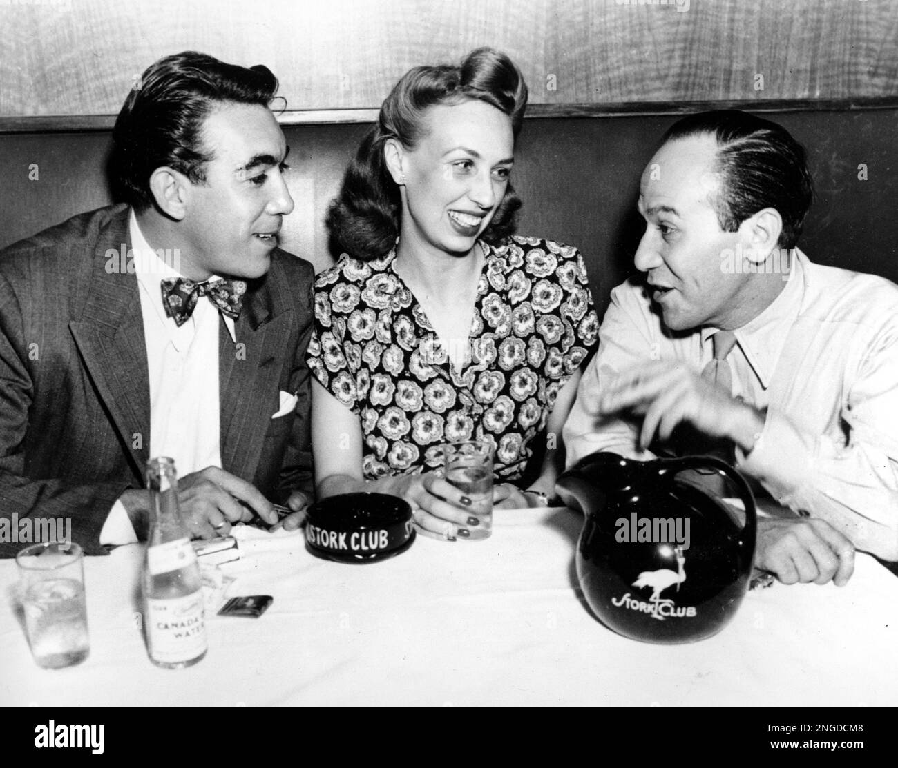 Actor Anthony Quinn, left, is shown with composer and lyricist Frank Loesser, right, and his ...