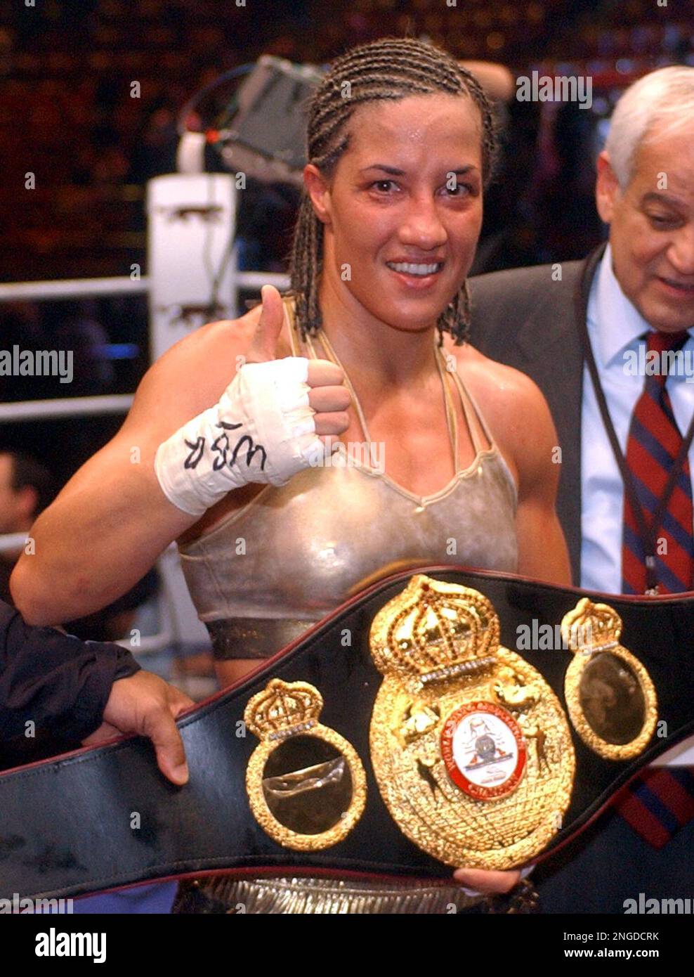 Myriam Lamare of France poses with the world belt after defeating Eliza ...