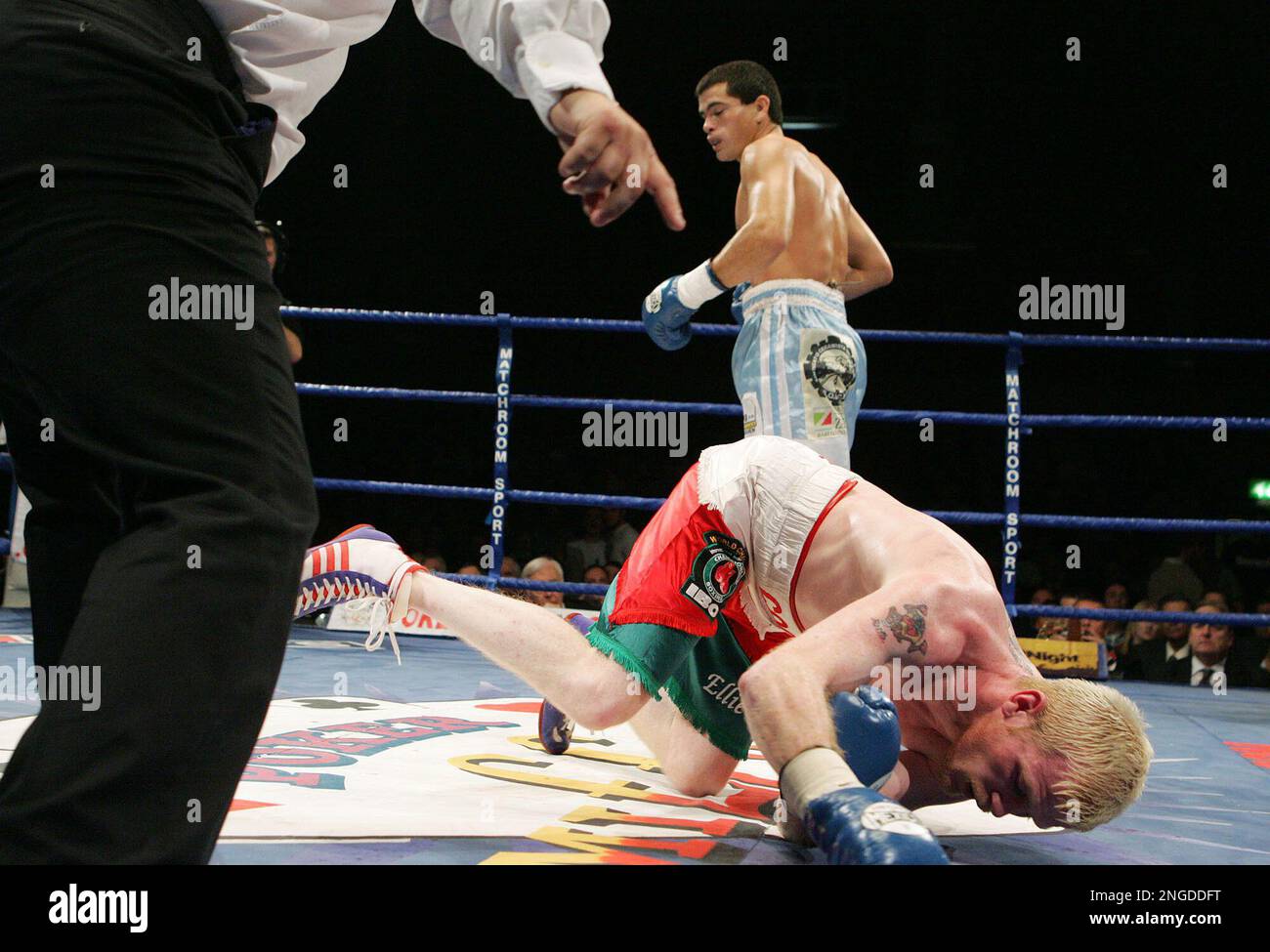 Argentina's Aldo Rios moves away after knocking down Welsh fighter ...