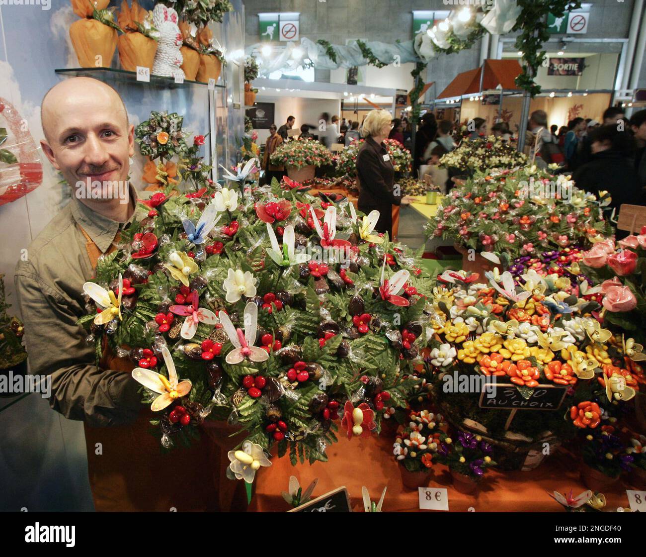 French chocolate maker Thierry Bonnet presents a bouquet of flowers ...