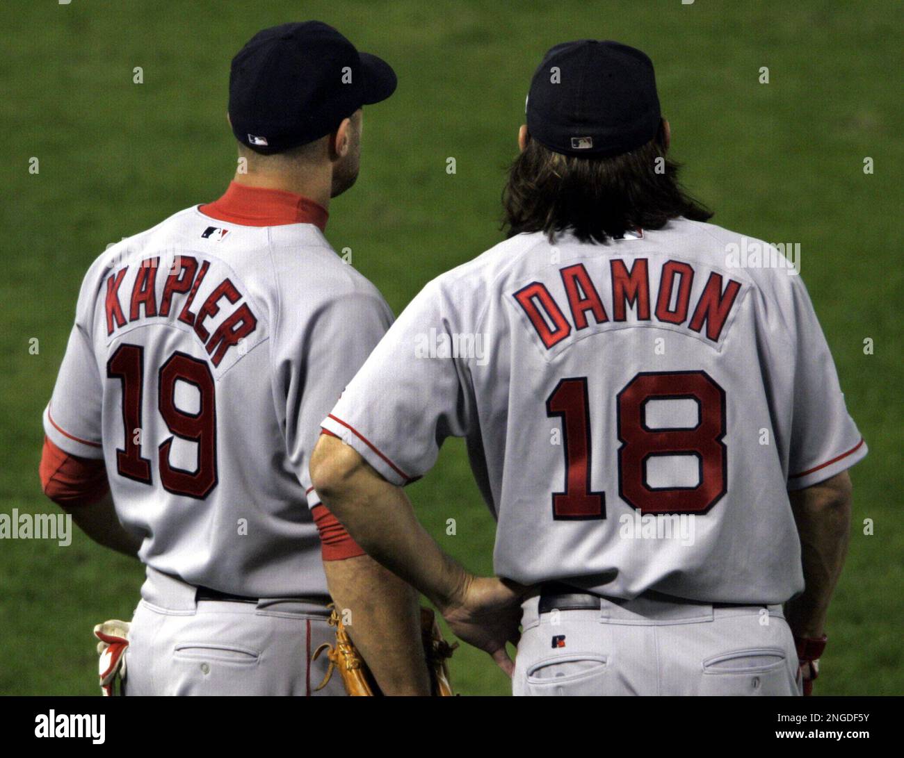 Boston Red Sox players Gabe Kapler (19) and Johnny Damon (18) stand ...