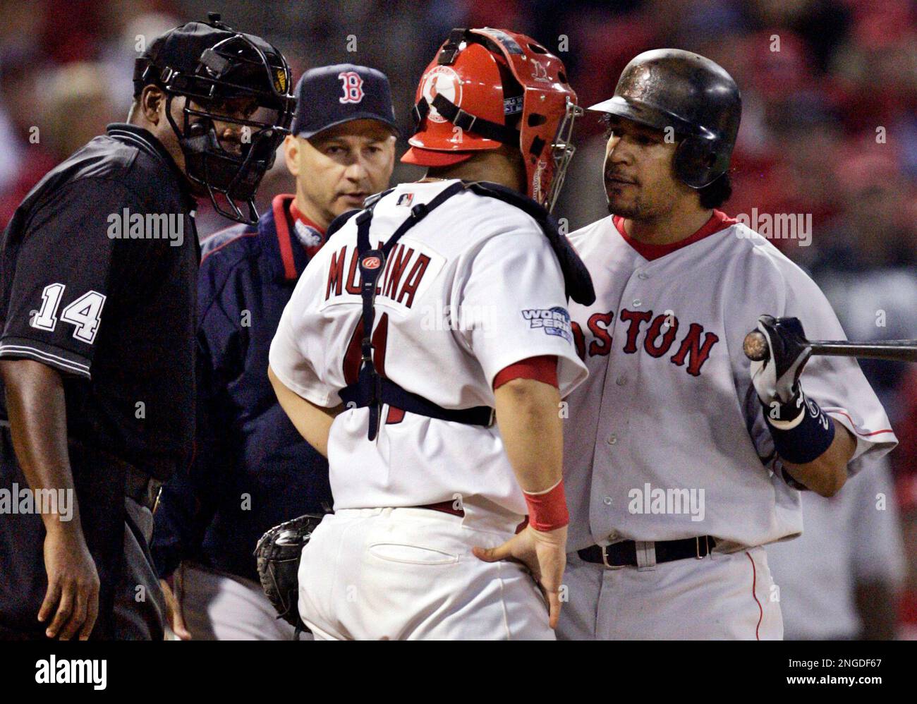 Boston Red Sox batter Manny Ramirez, right, has words with St. Louis ...