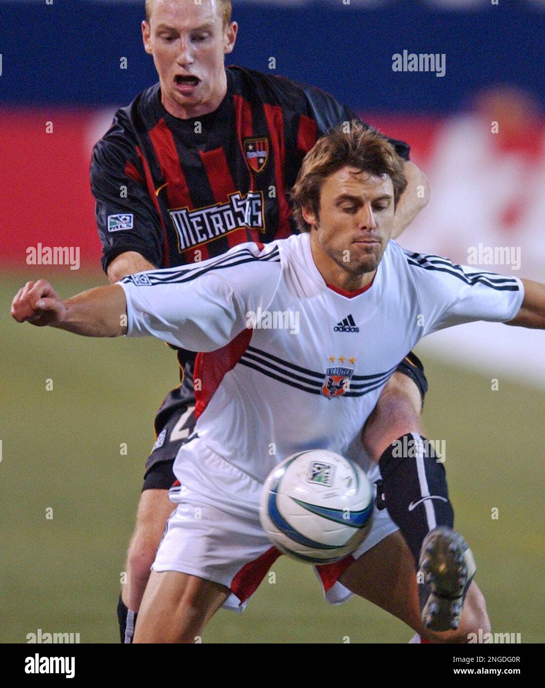 D. C. United midfielder Dema Kovalenko shields the ball from New York ...
