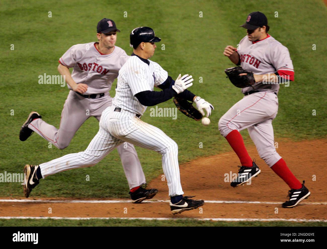 New York Yankees' Alex Rodriguez knocks the ball out of the glove of ...