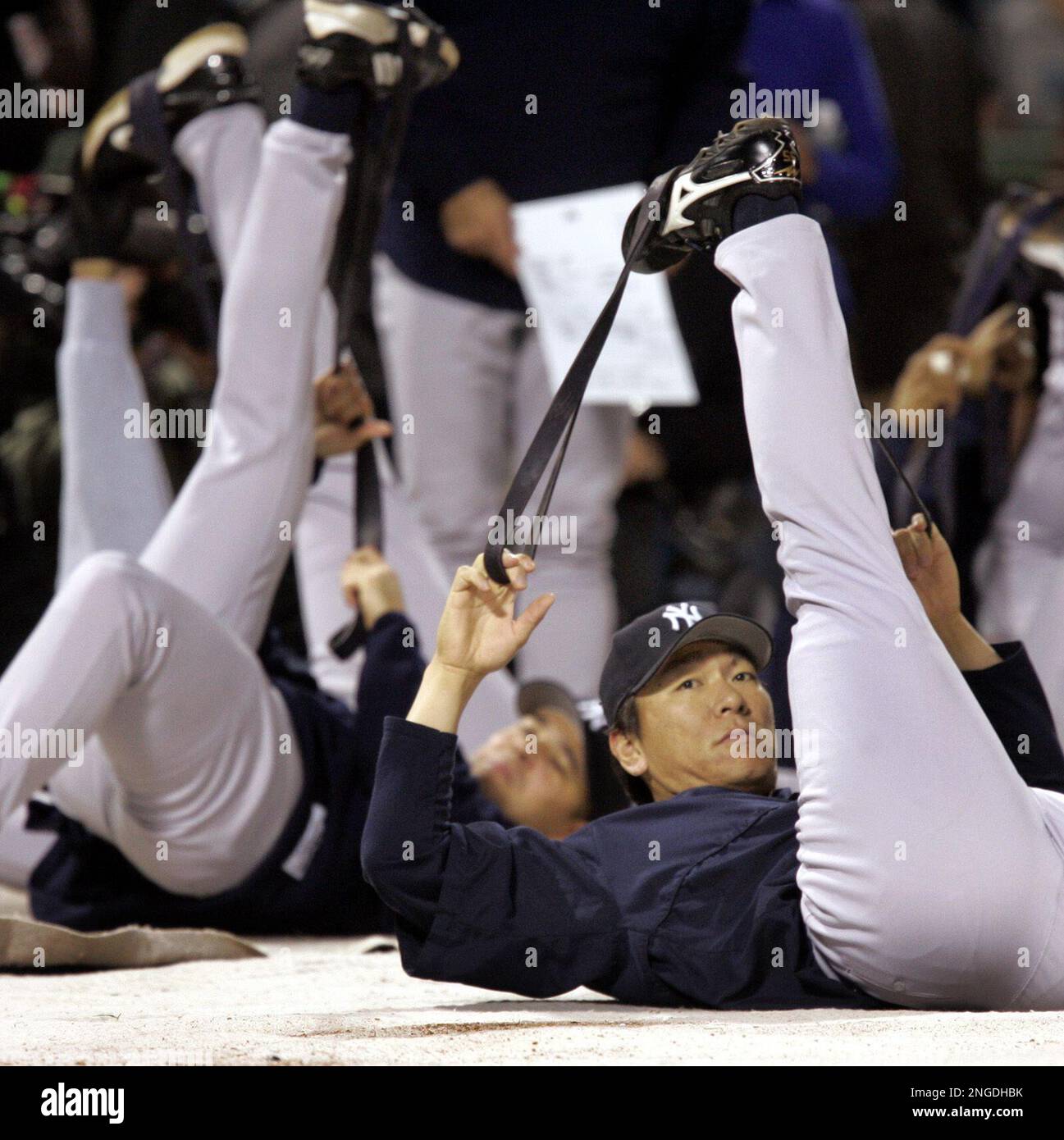 New York Yankees Hideki Matsui, right, stretches with teammates at ...