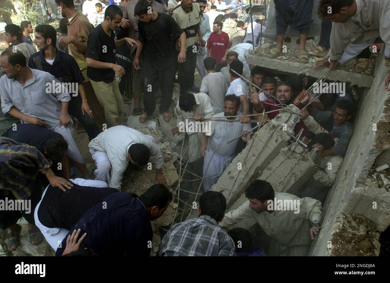 Iraqis search for survivors following a third US military airstrike on ...