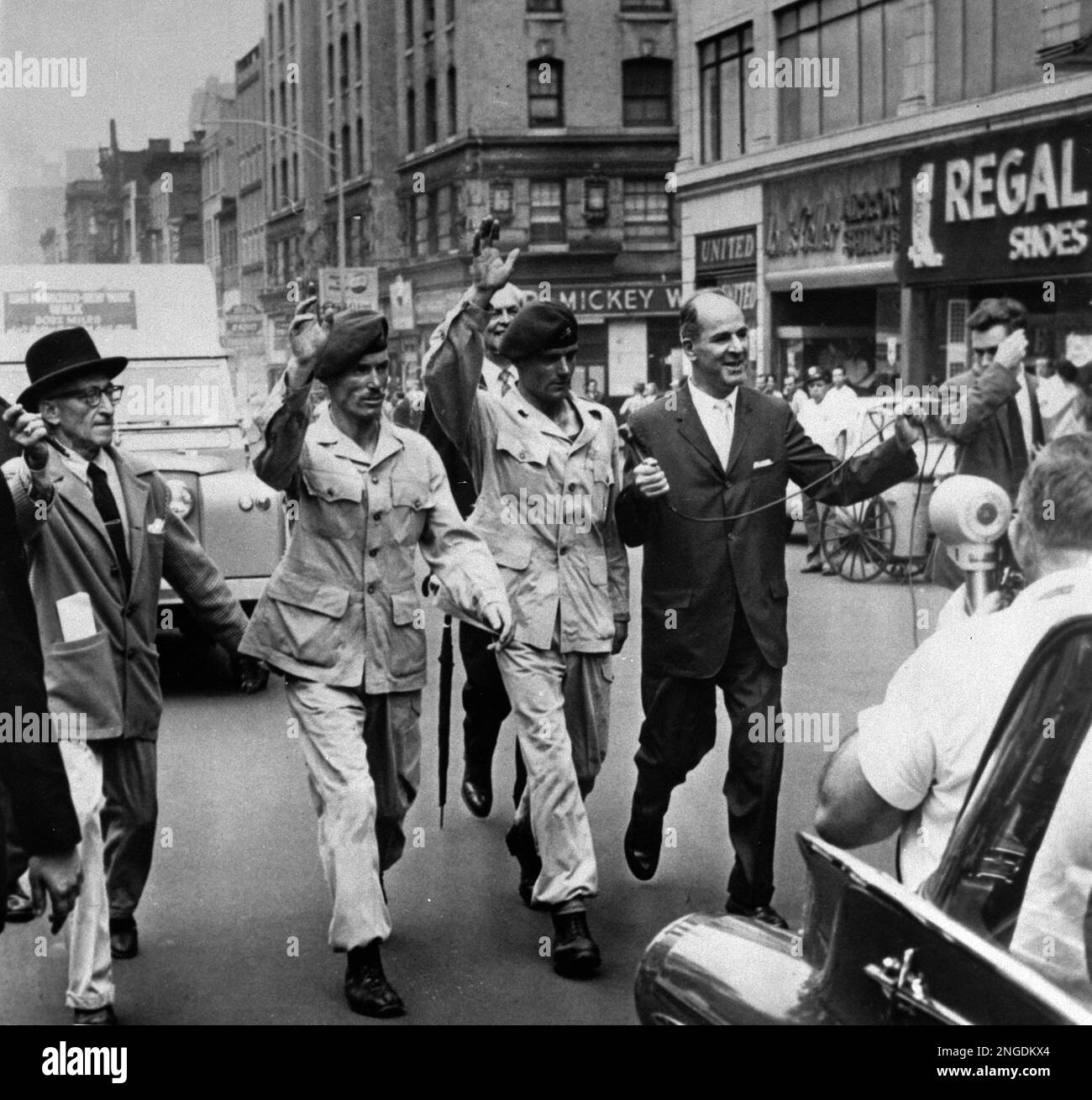 Flight Sergeant Patrick Maloney and Staff Sergeant Mervyn Evans wave to ...