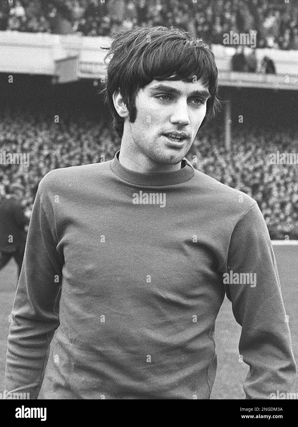 Northern Ireland and Manchester United footballer George Best stands on ...