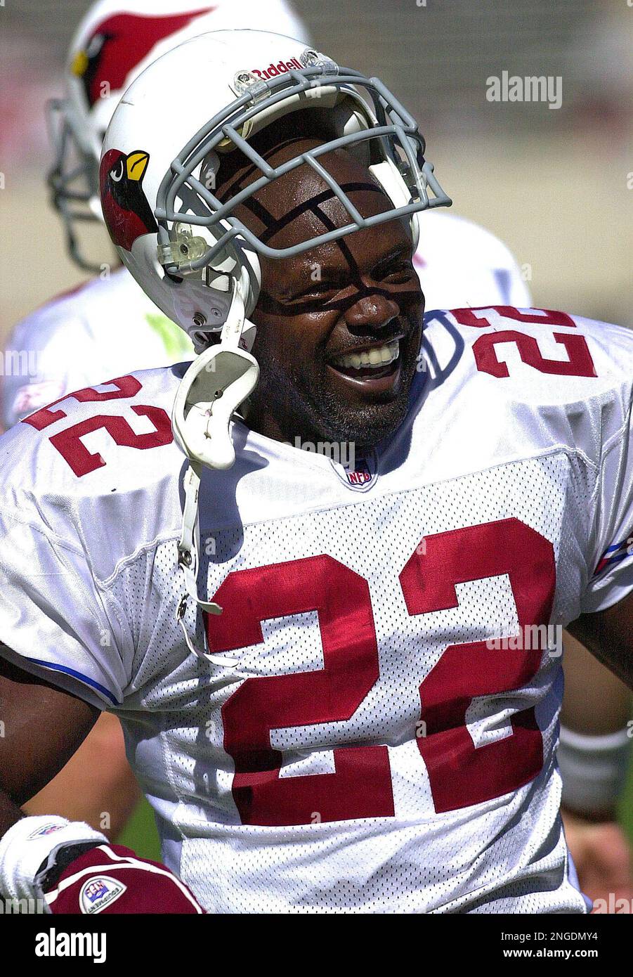 Arizona Cardinals runningback Emmitt Smith laughs after throwing his ...