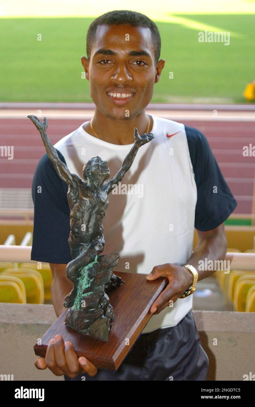 Ethiopian runner Kenenisa Bekele holds his male Athlete of the Year ...