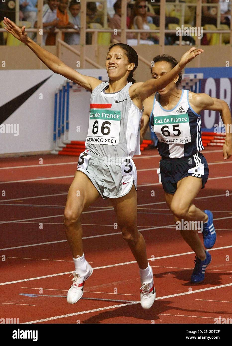 Olympic silver medalist Hasna Benhassi of Morocco, left, followed by ...
