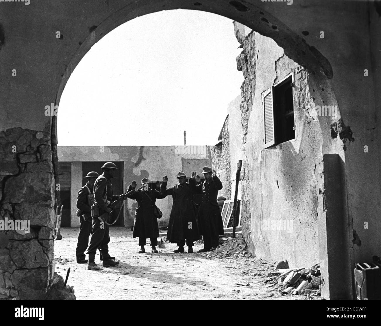 German Afrika Korps soldiers surrender to South African infantrymen in ...