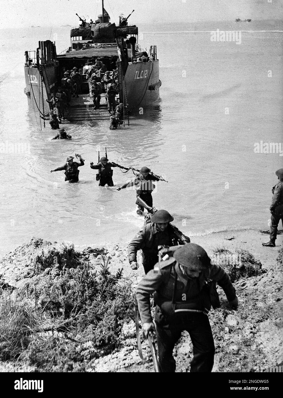 British troops disembark from tank landing craft during Combined ...
