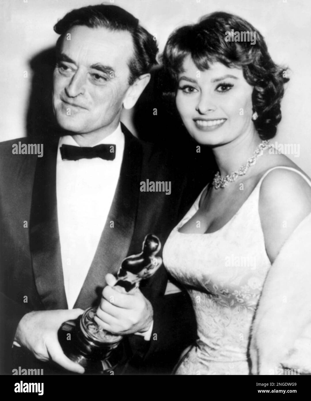 David Lean, British director of "The Bridge Over the River Kwai," holds ...