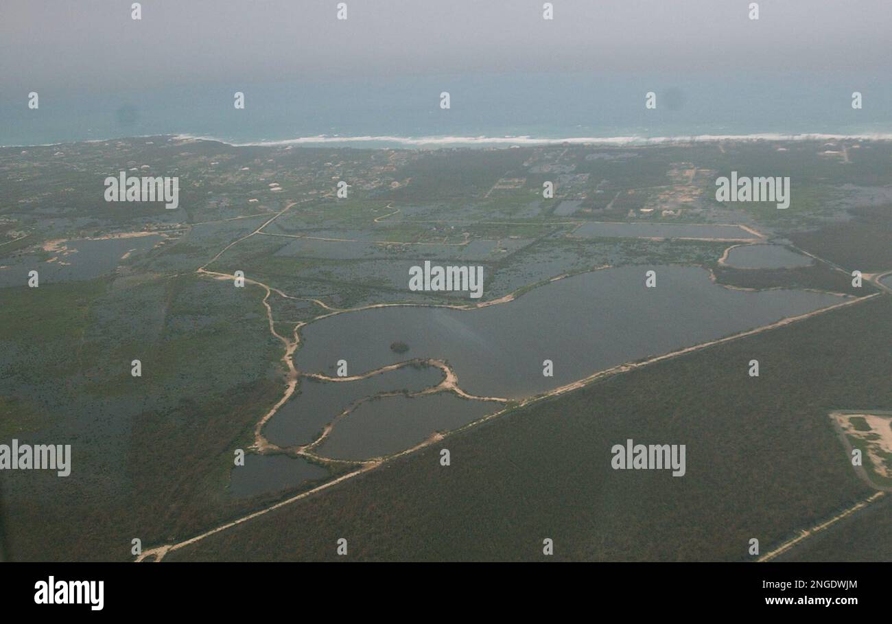 A aerial view shows large areas of Grand Cayman Island flooded after ...