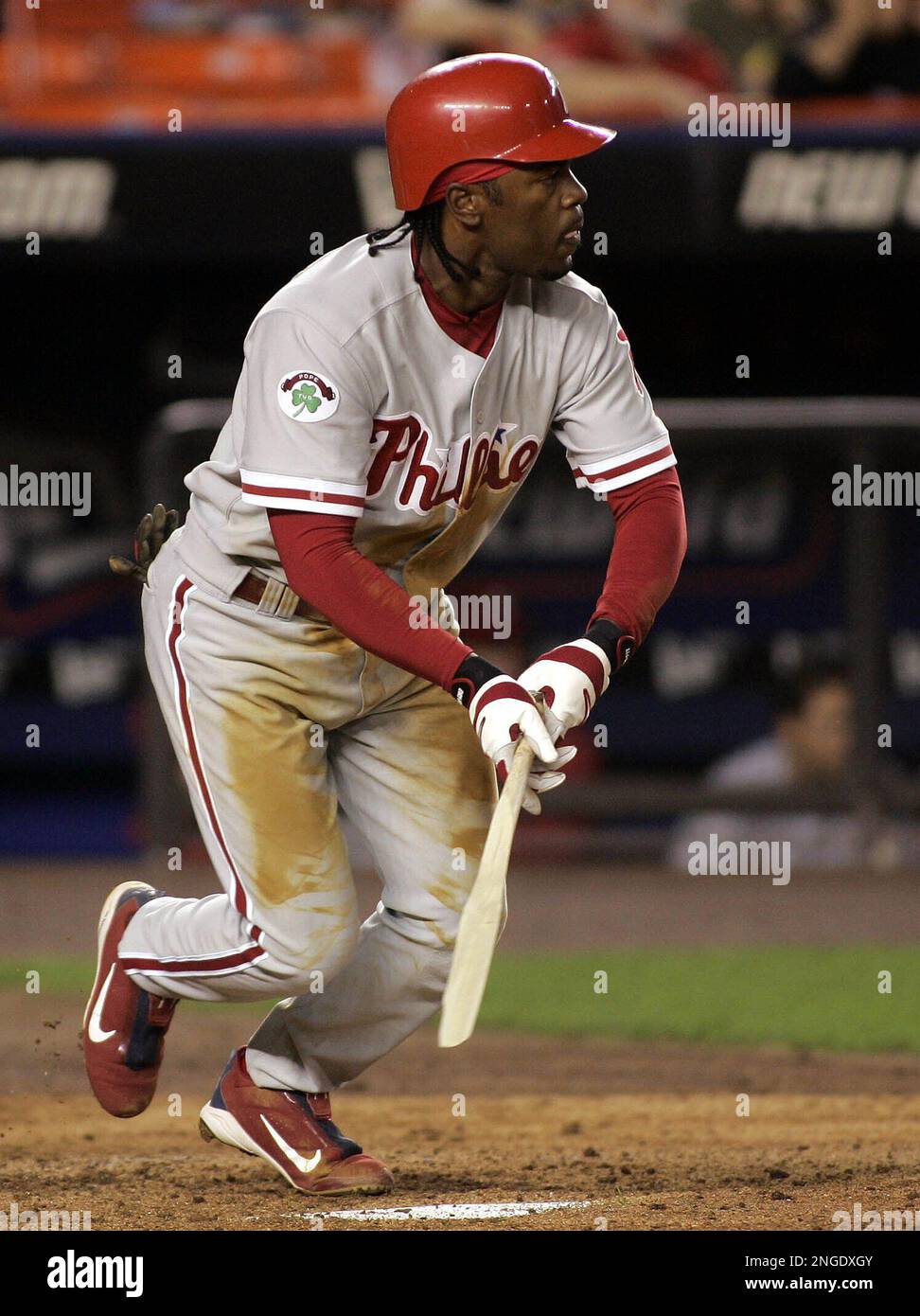 Philadelphia Phillies Jimmy Rollins takes off running after hitting a ...
