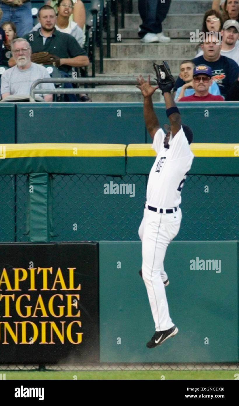 Detroit Tigers left fielder Rondell White makes the catch against the ...
