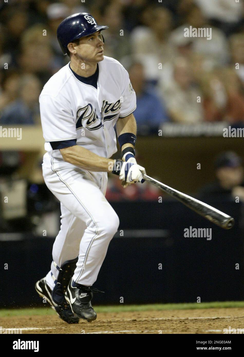 San Diego Padres' Mark Loretta follows the flight of his bases loaded ...