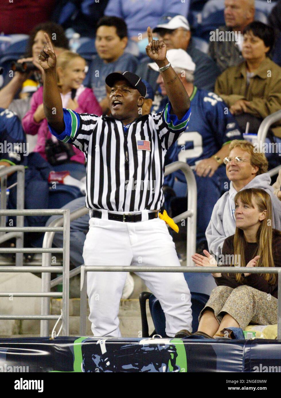 Seattle Seahawks fan Chris Corbray, a high school official cheers in ...