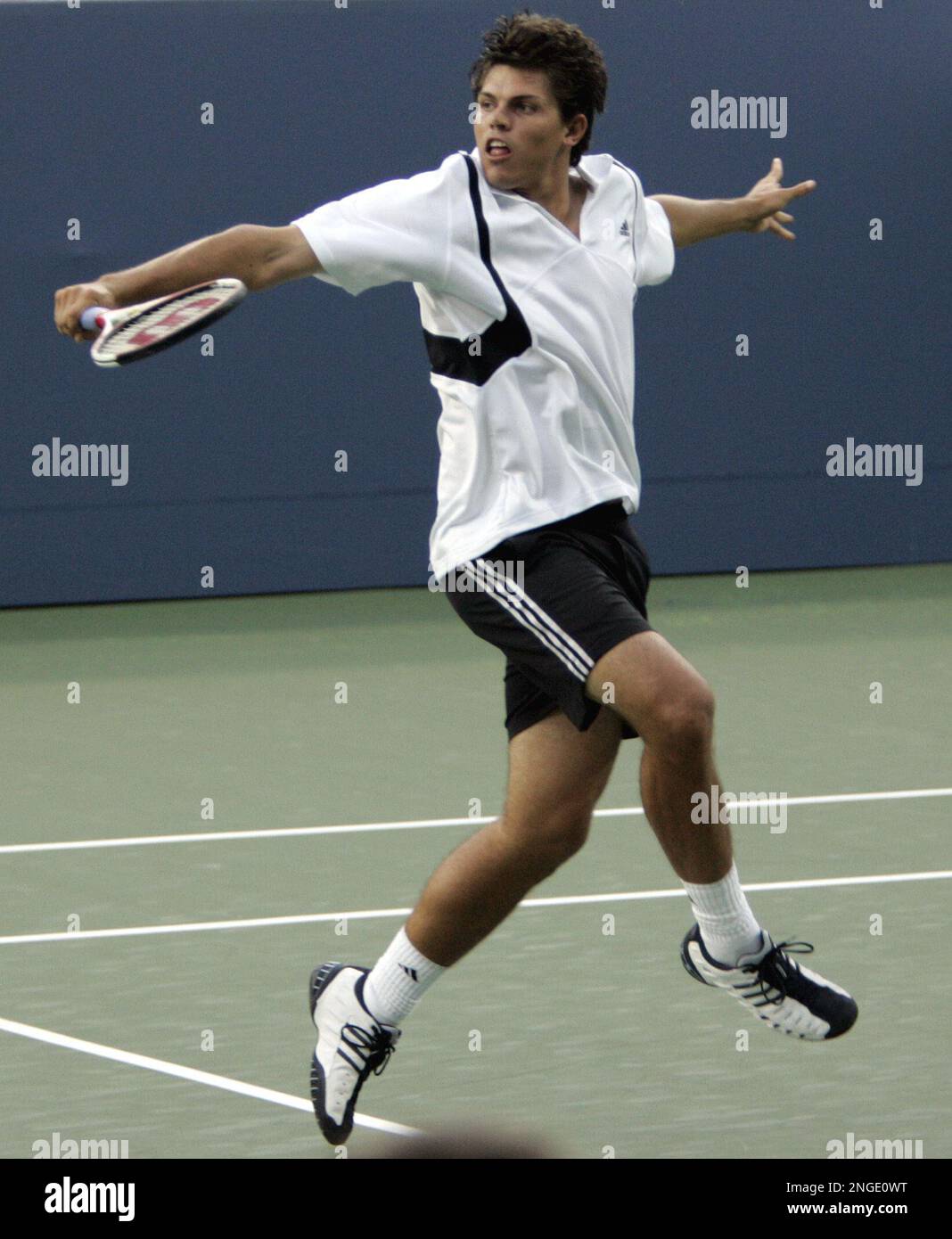 Taylor Dent, of the United States, watches his return to Paul-Henri ...