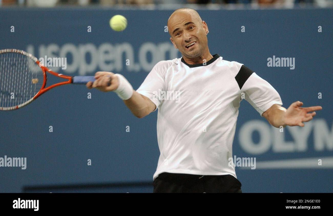 Andre Agassi from the United States eyes his return to Robby Ginepri ...