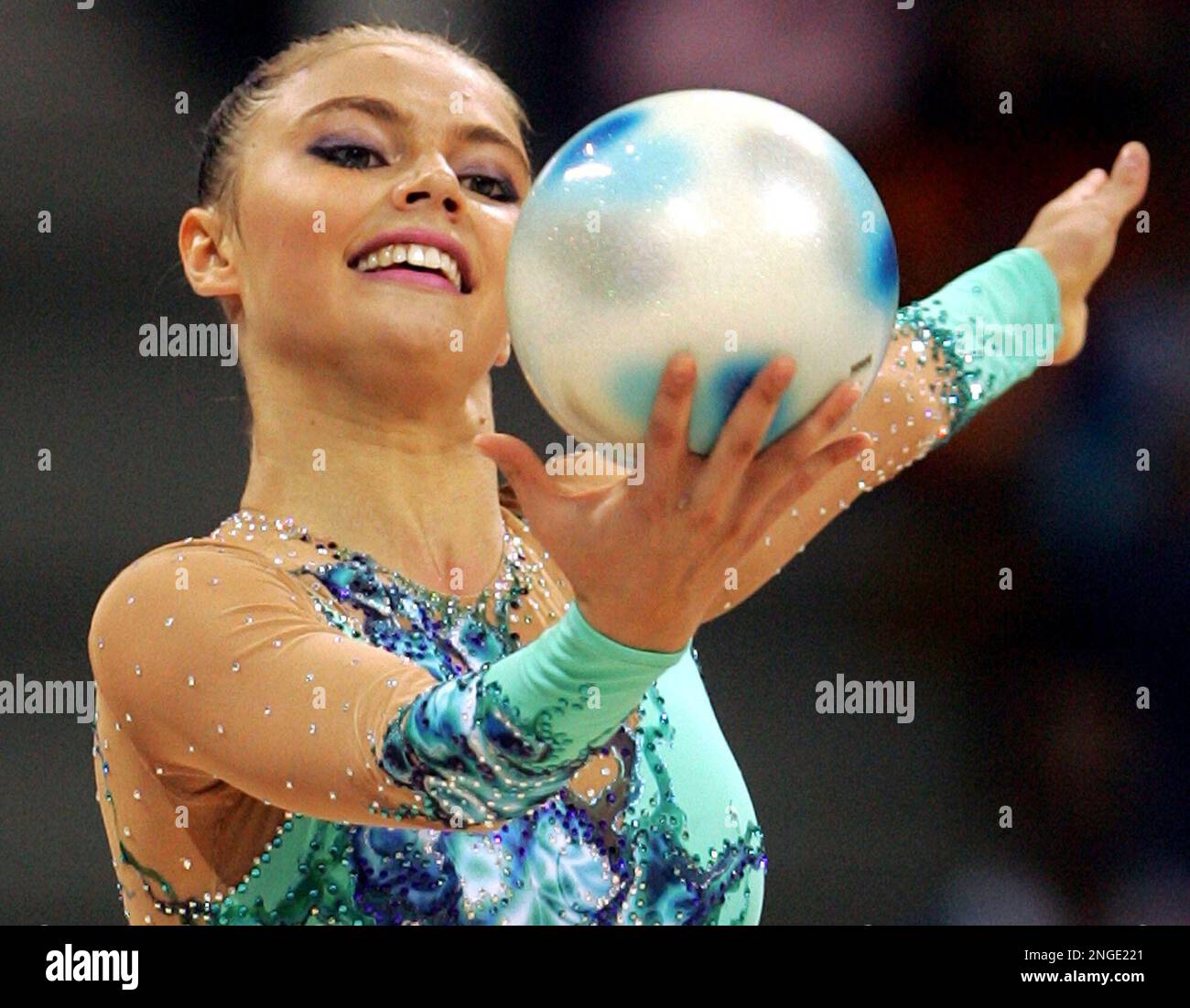 Russia's Alina Kabaeva performs with the ball during the final of the ...