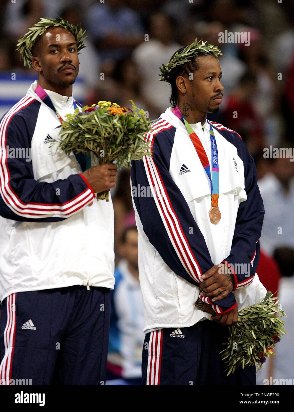 The USA's Stephon Marbury, left, and Allen Iverson wear long looks ...
