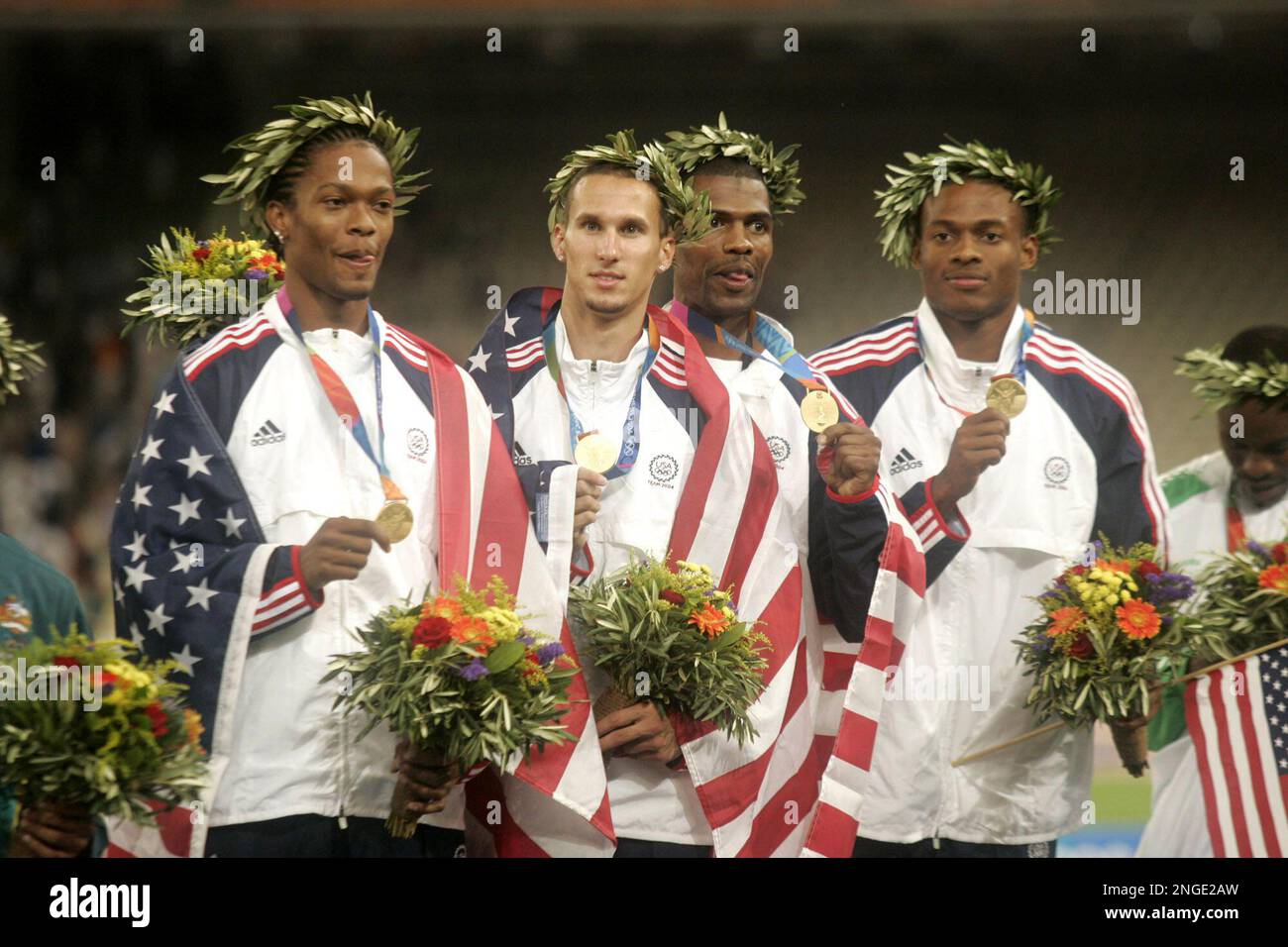 The US 4x400 gold medal winning team, from left, Darold Williamson ...