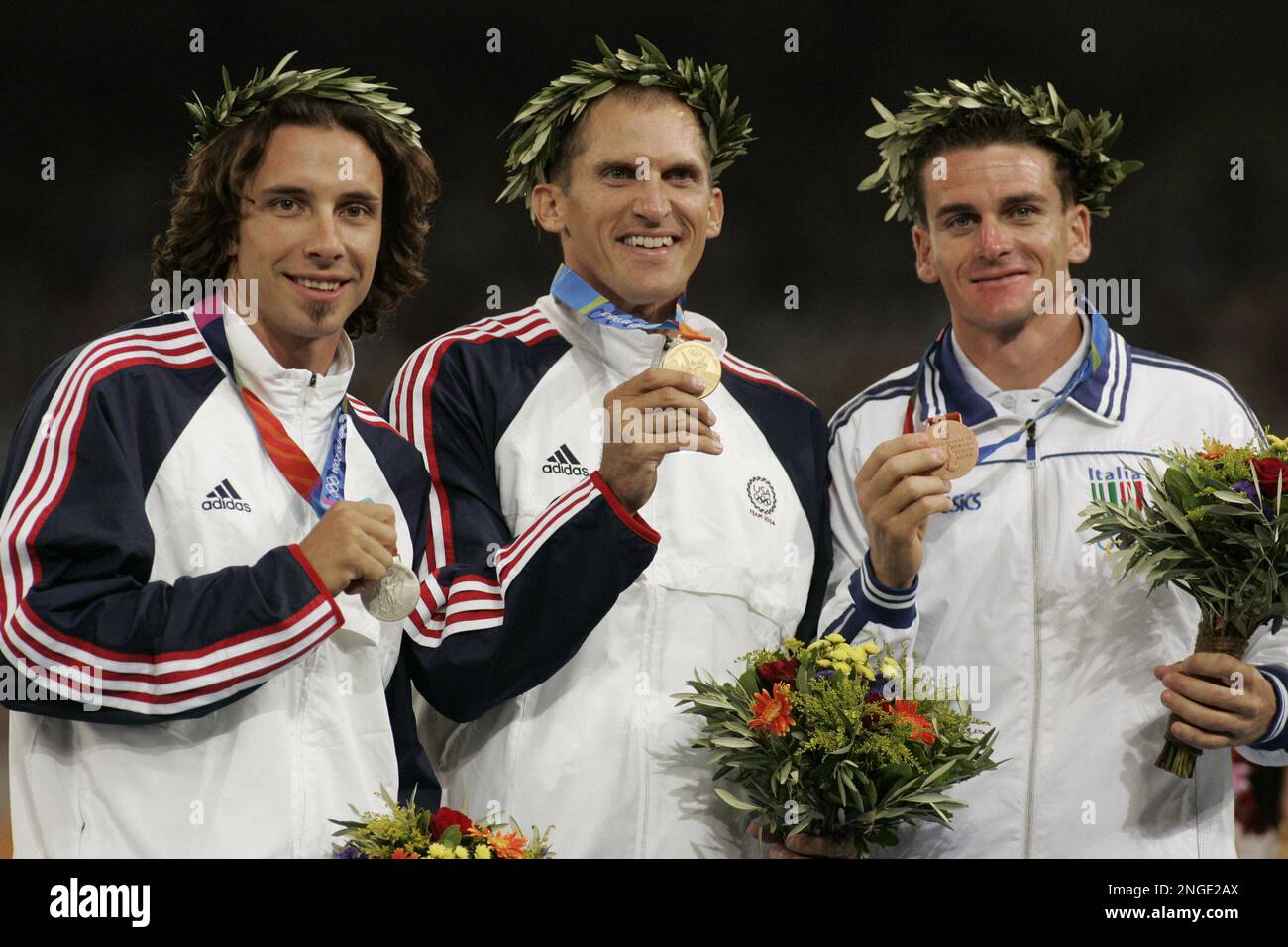 Silver-medalist Toby Stevenson, left, gold-medalist Timothy Mack of the ...