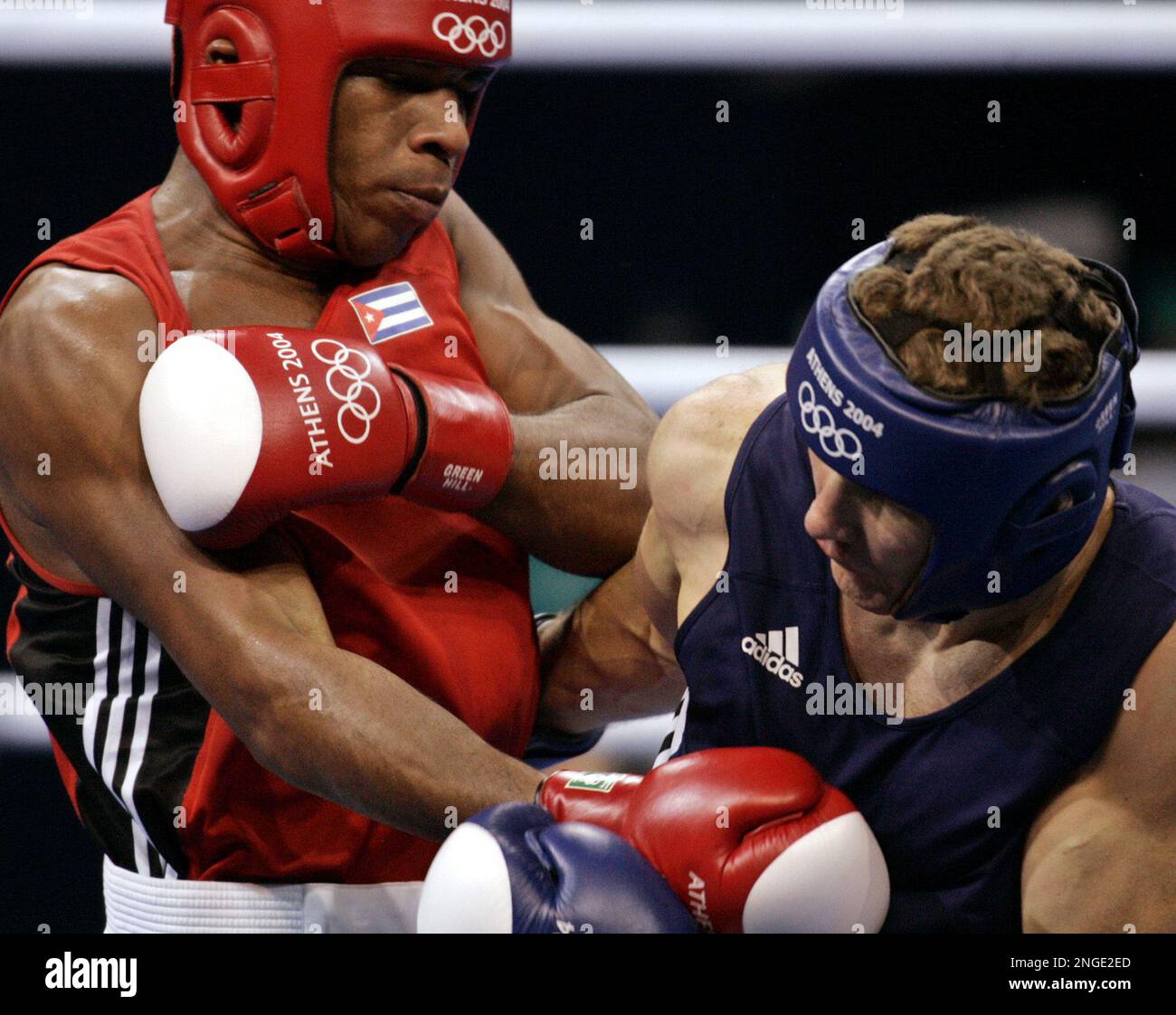 Cuba's Odlanier Solis Fonte, left, fights against Belarus' Viktar Zuyev ...