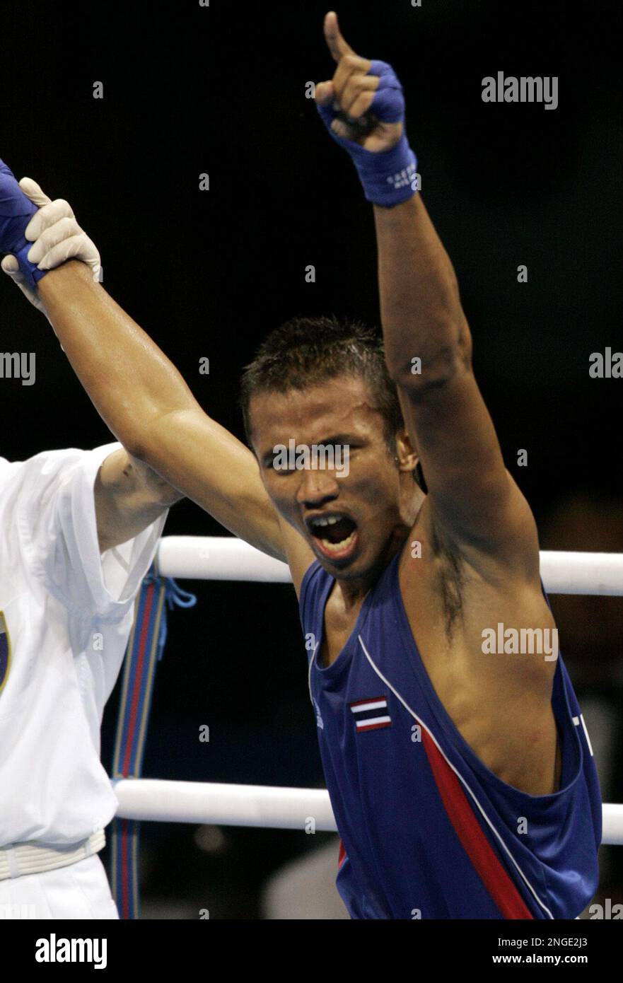 Thailand's Boonjumnong Manus flashes "No. 1" signal after defeating ...